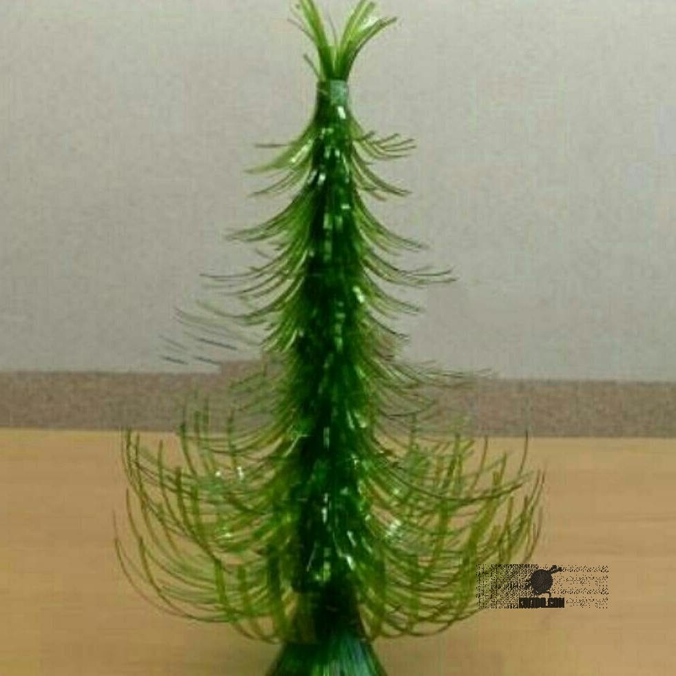 PINE TREE WITH SODA CANS